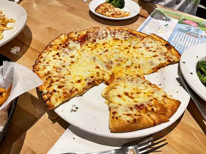 Their pizza doesn't just deliver cheese pulls &ndash; it performs full aerial acrobatics with them, stretching gloriously with each slice you grab.