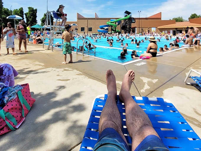 Summer's universal language: Laughter, splashing, and the occasional "Watch this!" fill the air as families create memories in crystal blue waters.