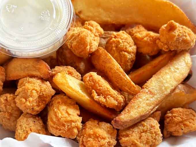 Popcorn chicken and fries &ndash; a golden, crispy mountain of comfort food that makes you wonder why anyone would ever eat anything else.