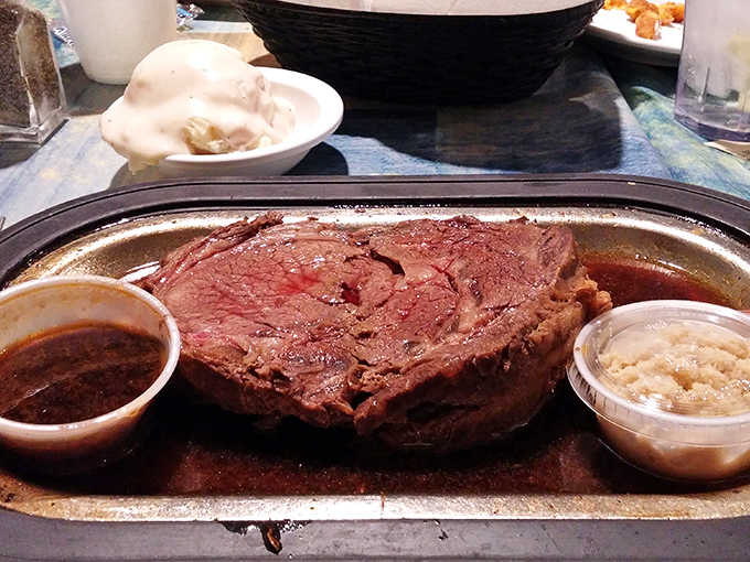 This massive prime rib could feed a small army, arriving with all the fixings and enough au jus to make every bite perfect.