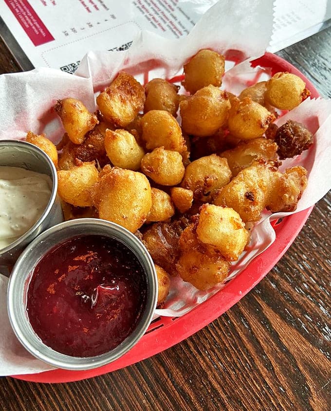 These aren't ordinary cheese curds &ndash; they're crispy, golden nuggets of joy that stretch and pull with each heavenly bite.