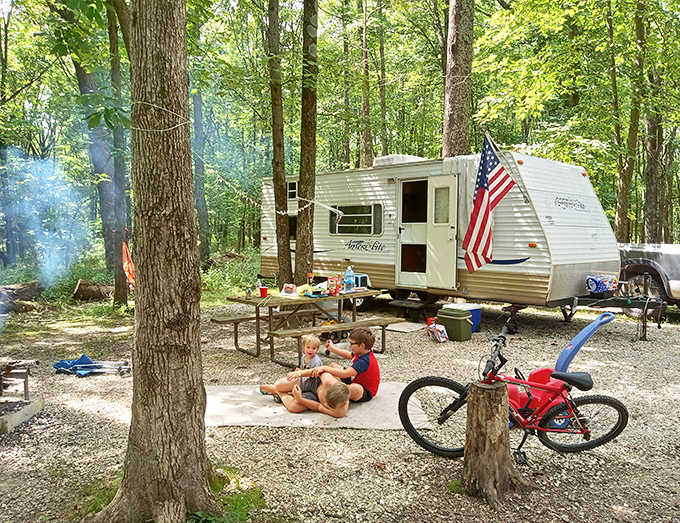 Camping 101: Kids, bikes, and s'mores – the timeless trinity of outdoor family memories being made in real time.