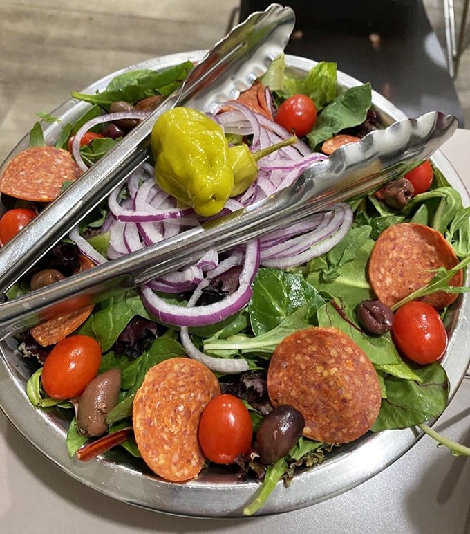 The Pizza Joint Salad isn't an afterthought &ndash; it's a Mediterranean-inspired palate cleanser between bites of pizza perfection.