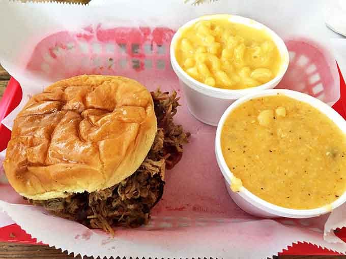 The ultimate comfort food duo: a perfectly stuffed sandwich alongside creamy mac and cheese that would make your grandmother jealous.