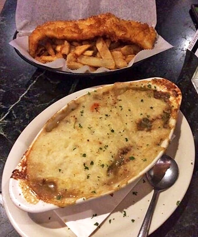 The ultimate comfort food duo: golden-battered fish with hand-cut chips alongside the legendary Shepherd's Pie.