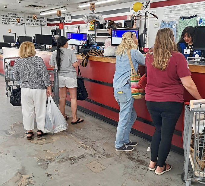 The checkout line: where treasure hunters compare their bounty and secretly wonder if that lady found something they missed.