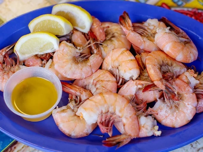 Steamed shrimp so plump and sweet they barely need the accompanying butter – though that golden dip takes them to another level entirely.