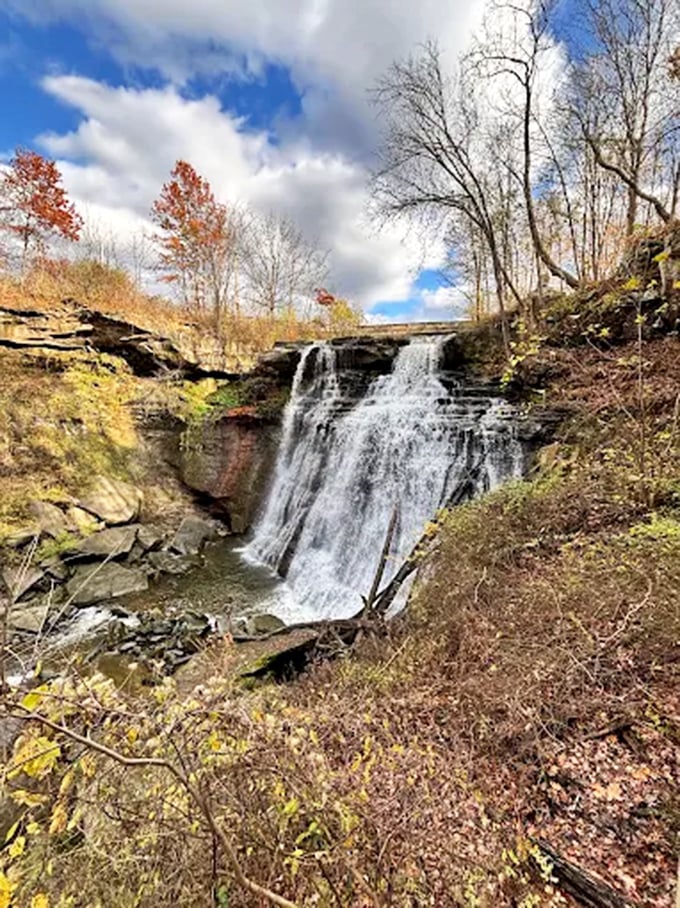 The side view reveals the waterfall's secret &ndash; layers of sandstone and shale creating nature's perfect staircase for 60 gallons per second.