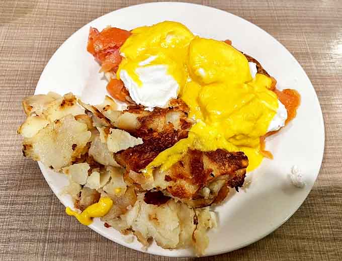 The Smoked Salmon Benedict offers an oceanic twist on the classic, with delicate salmon complementing those perfectly poached eggs.