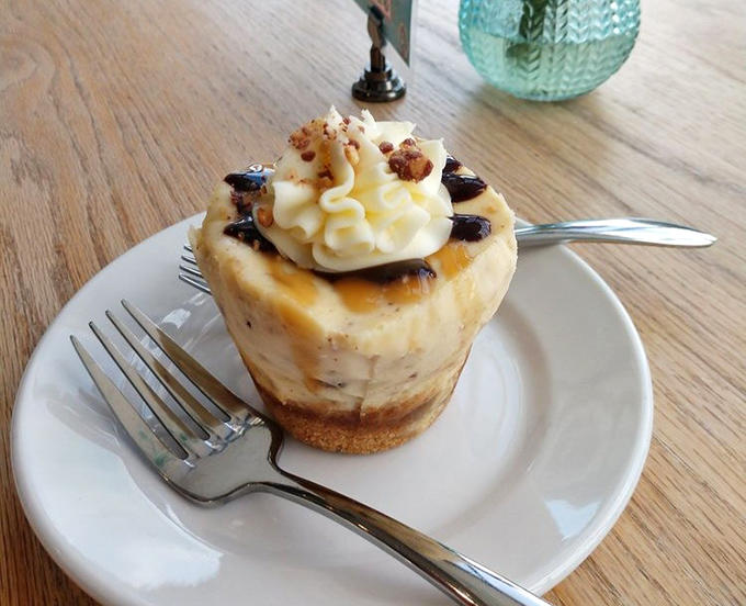 This Snickers-inspired masterpiece isn't just a cheesecake, it's what happens when candy bars dream of becoming something greater in their next life.