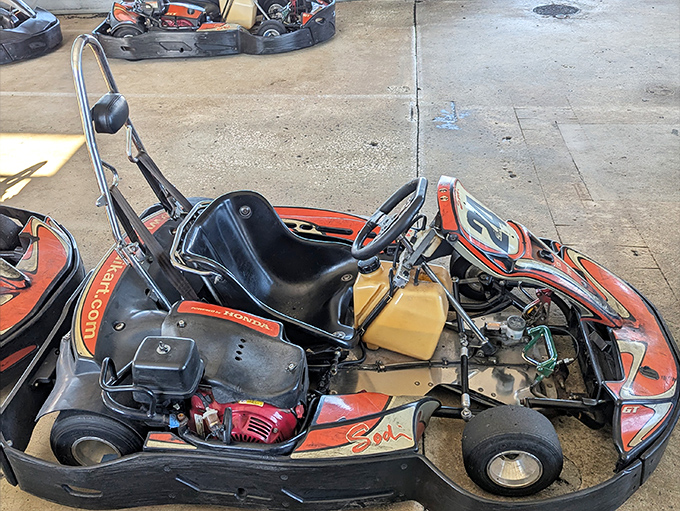 A close-up reveals the engineering behind these racing machines &ndash; Honda engines and precision components that deliver surprising performance.