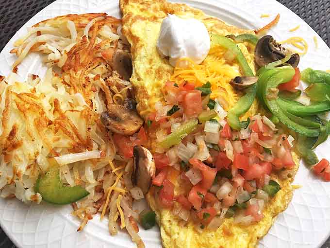 The Southwestern omelet arrives loaded with enough toppings to make your taste buds do the salsa, literally and figuratively.