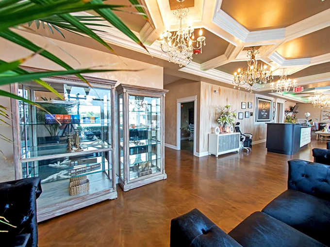 Elegance meets tranquility in this reception area where chandeliers sparkle overhead and plush seating invites you to begin unwinding before treatments even start.