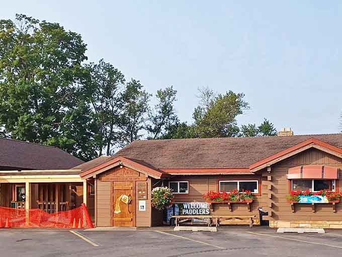 Spike's Keg O'Nails welcomes hungry travelers with rustic charm and burgers that require a strategy to eat.