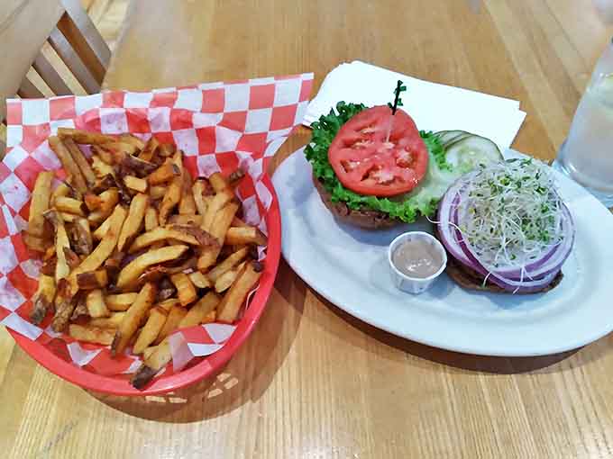 Sprout Burger: A tower of freshness featuring crisp sprouts, juicy tomato, and all the fixings &ndash; proof that vegetarian options can be the star of the show.