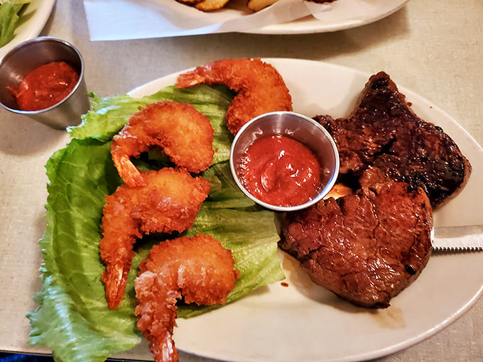 Ocean meets pasture in perfect harmony &ndash; golden-fried shrimp with a snap and steak cooked exactly how you asked for it. Simple presentation, extraordinary flavor.