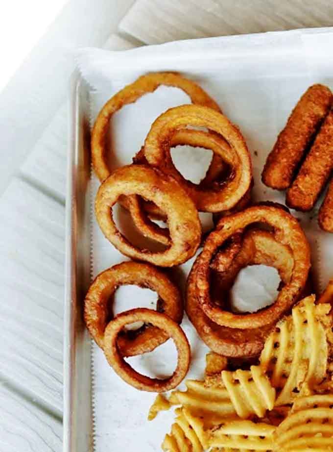 Golden-brown onion rings that make you question your life choices &ndash; why have you ever eaten anything else when these crispy, sweet-savory halos exist?