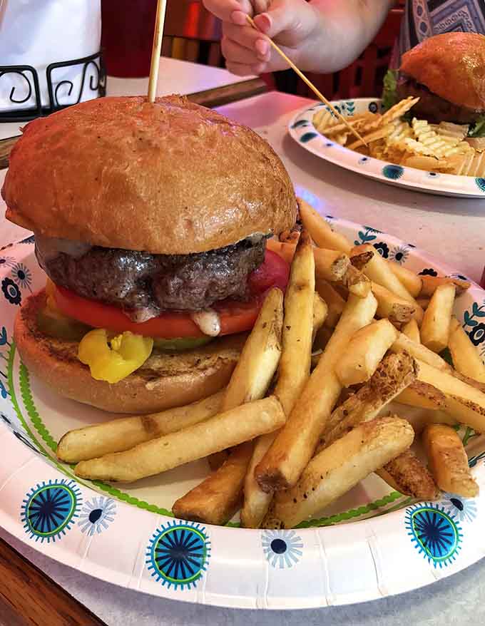 Sometimes simple perfection is all you need: a classic burger with fries that'll make you forget every diet.