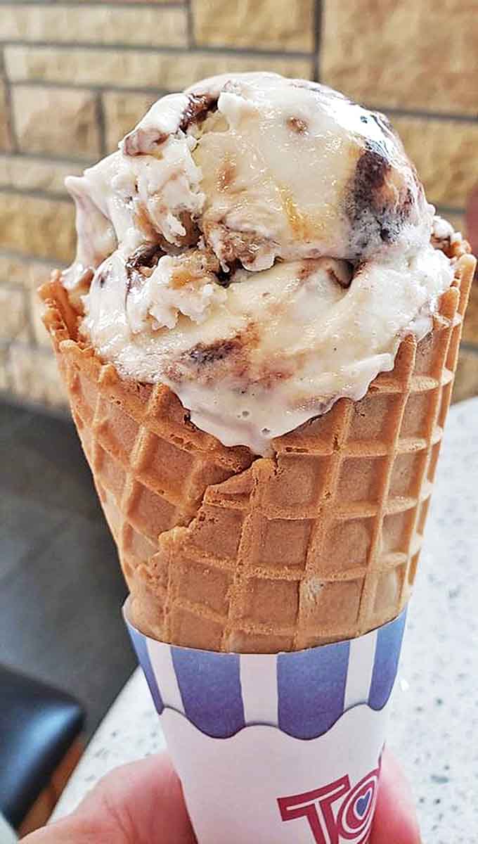 This isn't just any waffle cone &ndash; it's architectural support for a perfect scoop of turtle ice cream that makes dairy-free living look downright indulgent.