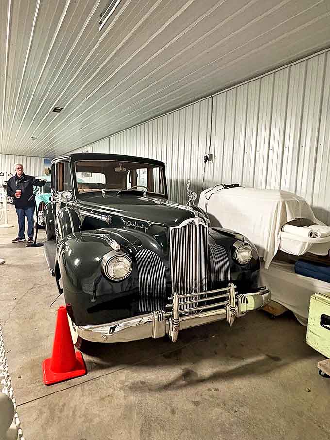 This elegant Packard hearse represents the transition to motorized funeral vehicles – American automotive innovation meeting timeless tradition.