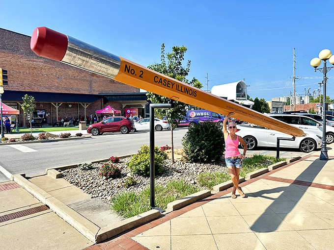 Tourists can't resist posing with Casey's famous pencil, creating perspective-bending photos that confuse friends back home.
