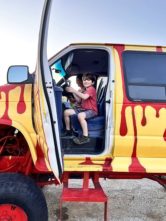 A young adventurer takes the wheel, already plotting which neighborhoods to terrorize once naptime is over.