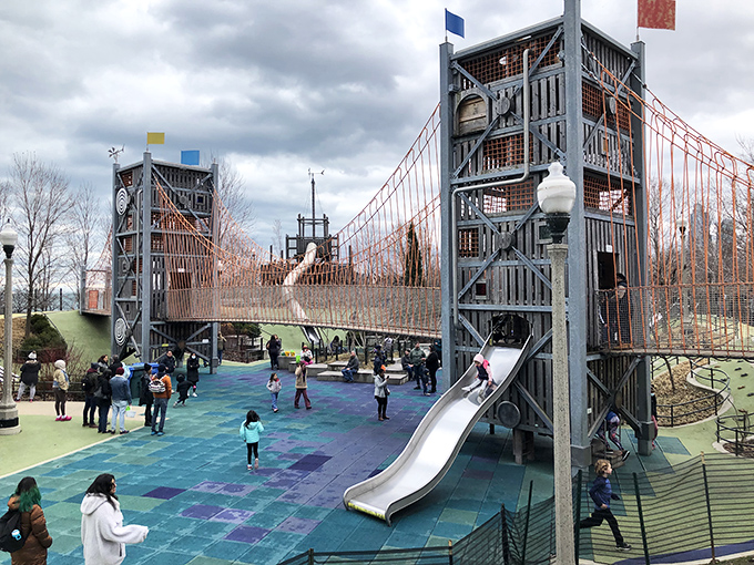 The suspension bridge playground feature mimics Chicago's famous bridges, letting kids (and brave adults) experience thrilling heights with skyline views.