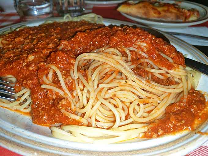 Pasta perfection! Each strand of spaghetti wears its rich, robust sauce like a custom-tailored Italian suit.