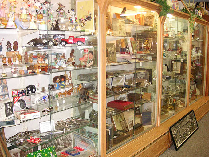 Curated collections of figurines and decorative pieces create miniature worlds where nostalgia lives in perfect, dust-free suspension.