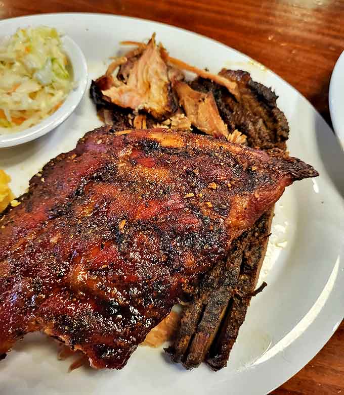 Ribs with bark so perfect they should be in a barbecue museum &ndash; showcasing that telltale pink smoke ring of proper technique.