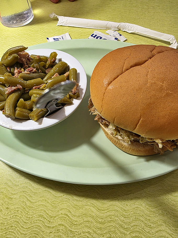 Green beans that have slow-danced with ham hocks accompany a sandwich that's been perfected over generations of practice.