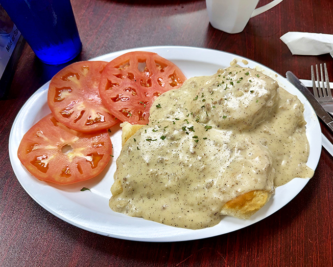 The classic biscuits and gravy with fresh tomato slices &ndash; Florida's idea of "eating light" still involves gravy.