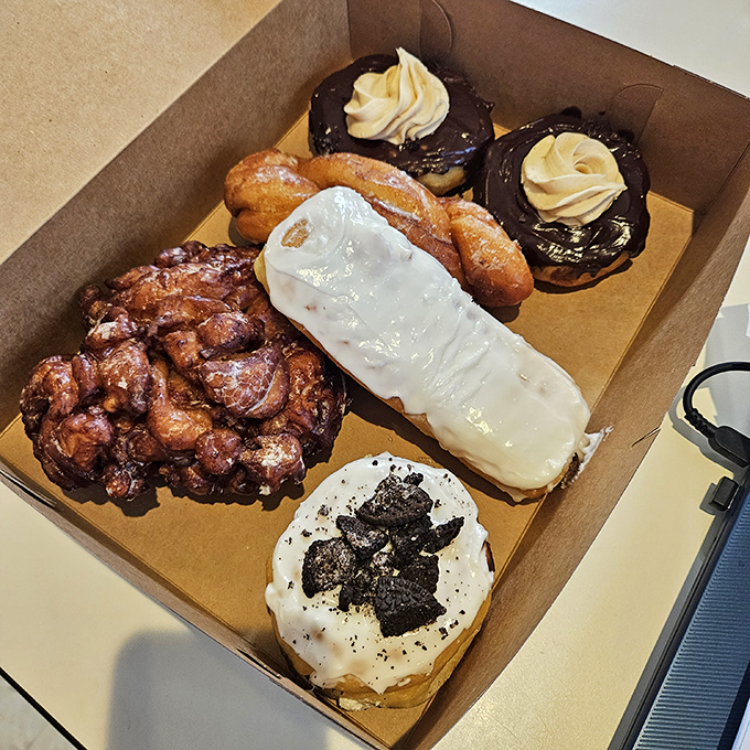 A box of donuts that makes the car ride home feel like an eternity of temptation. "Just one for the road" quickly becomes "oops, where did they all go?"