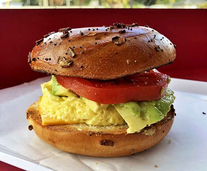 Avocado adds creamy richness to this breakfast bagel, while the perfectly cooked egg creates a sunrise of flavor in every bite.