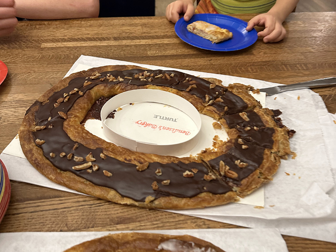 This chocolate-topped kringle with pecan accents isn't just dessert&mdash;it's an edible work of art that's worth every calorie.