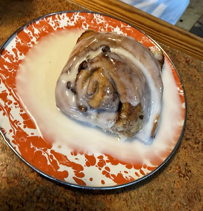 This isn't just any cinnamon roll &ndash; it's a spiral-shaped miracle of butter, cinnamon, and cream cheese frosting that's worth every delicious calorie.