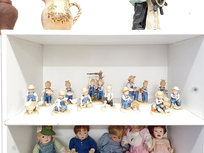 A charming collection of vintage figurines and dolls, each one capturing a sweet, nostalgic moment.
