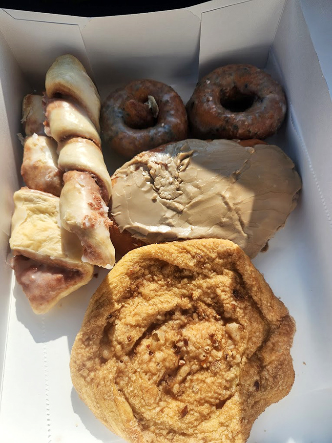 A box of mixed delights that makes any bad day better &ndash; chocolate-glazed donuts and nut-topped pastries that are worth every calorie.