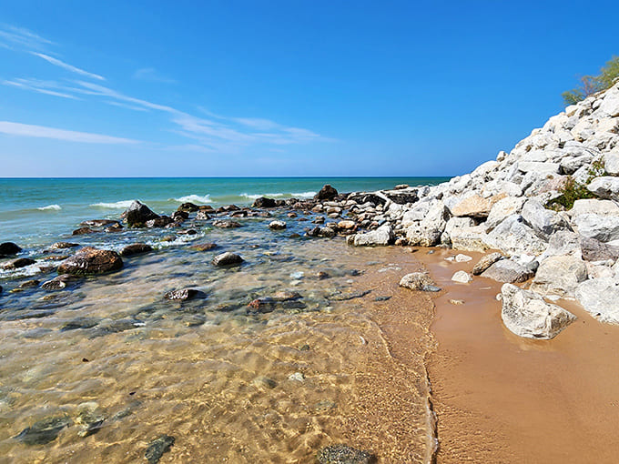 Where stone meets water: Lake Michigan's rocky shoreline offers a peaceful retreat from the sandy expanses, perfect for contemplative beachcombing.