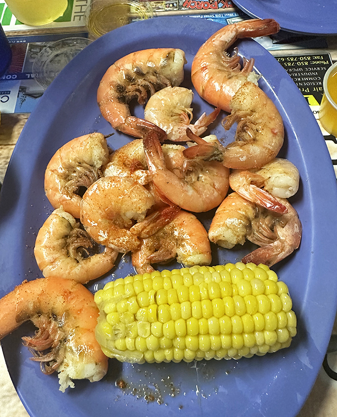 Gulf shrimp so fresh they practically introduce themselves before jumping onto your plate, accompanied by summer's perfect sidekick—sweet corn.