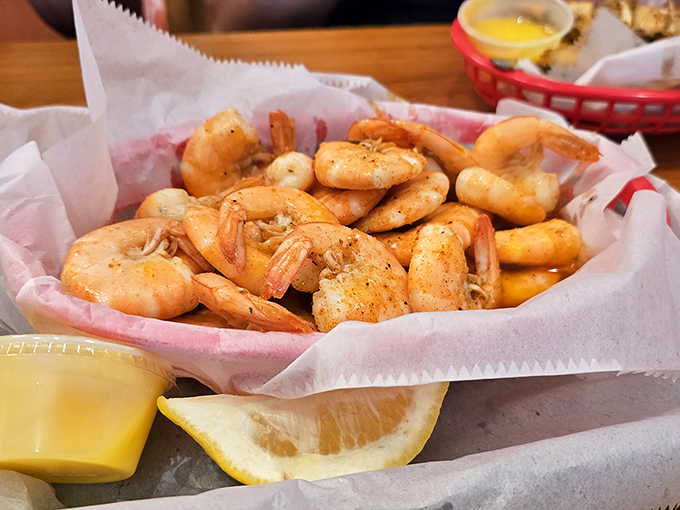 Golden-fried shrimp that snap with freshness, needing nothing more than a squeeze of lemon and maybe a dunk in that butter sauce.