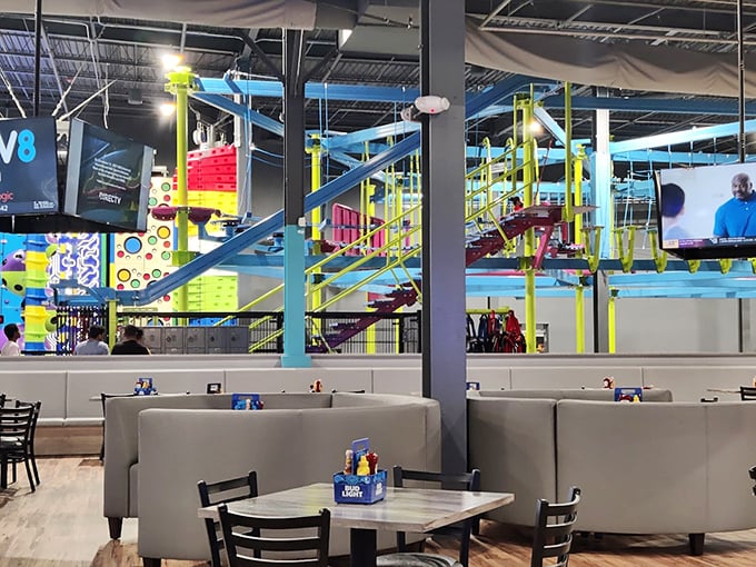 Comfortable booth seating overlooks the Sky Trail ropes course &ndash; grab a snack and watch brave souls navigate obstacles while you rest your feet.