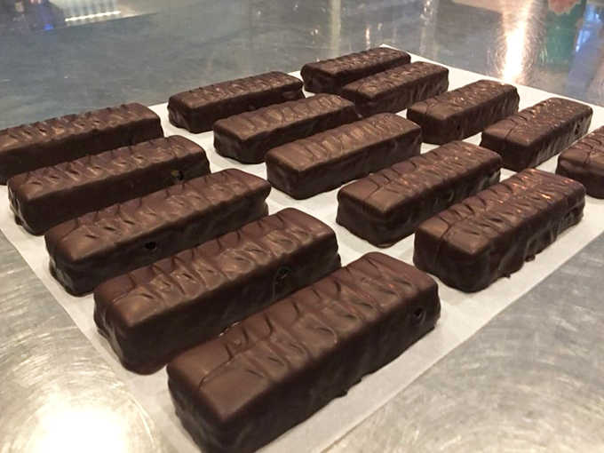 These indulgent bars combine rich dark chocolate with creamy peanut butter and a satisfying crispy texture.