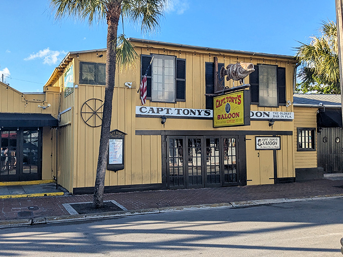 Captain Tony's Saloon's bright yellow exterior stands as a colorful landmark in Key West's historic district. This former morgue now serves spirits of a different kind.
