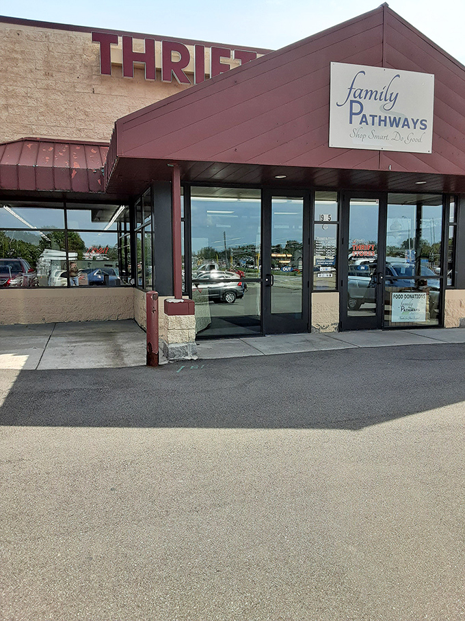 Family Pathways' distinctive burgundy awning signals a thrifting destination where bargain hunting supports local community programs.