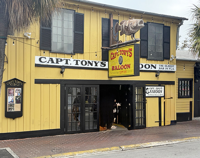 The historic Captain Tony's Saloon proudly displays its name across the facade. This legendary Key West watering hole once hosted Ernest Hemingway.