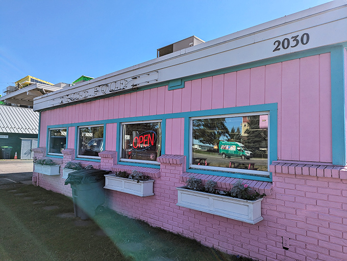 The cheerful turquoise trim and flower boxes at Don's Drive-In add a touch of mid-century charm to this Traverse City landmark.
