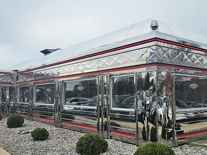 The polished stainless steel and glass block windows of Park Diner create a shimmering beacon of nostalgia in Waite Park.