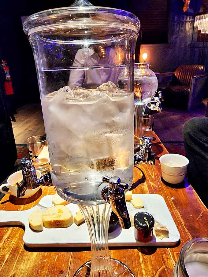 A sugar cube erupts in blue flame before being extinguished in absinthe, leaving behind caramelized sweetness that tames the spirit's complex herbal bite.