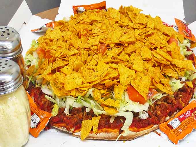 The legendary Midwest taco pizza &ndash; where crushed Doritos meet lettuce, tomato and seasoned beef in a combination that shouldn't work but absolutely does.